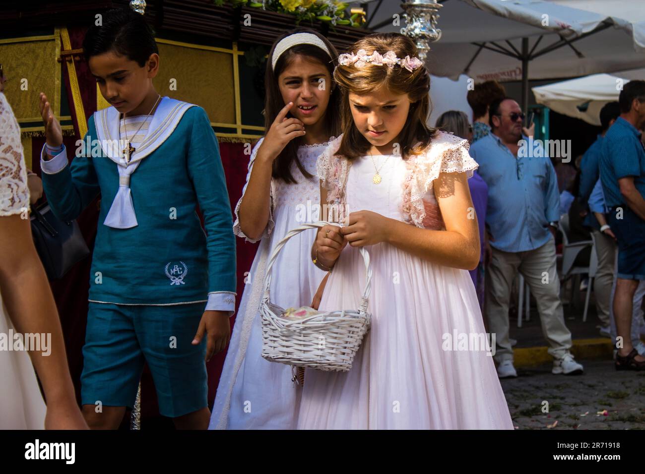 Young children participating at the Corpus Christi procession, an age ...