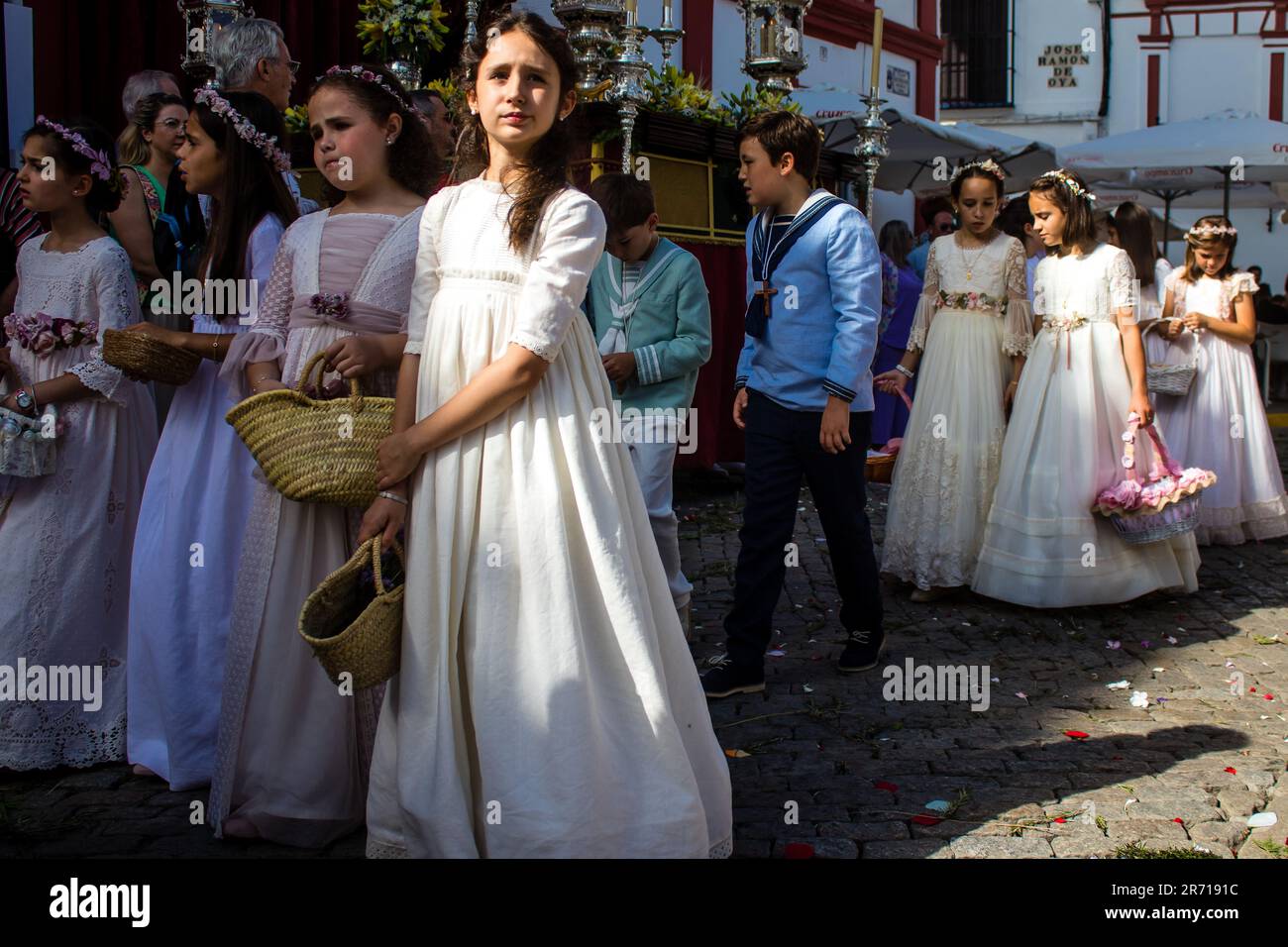Young children participating at the Corpus Christi procession, an age ...