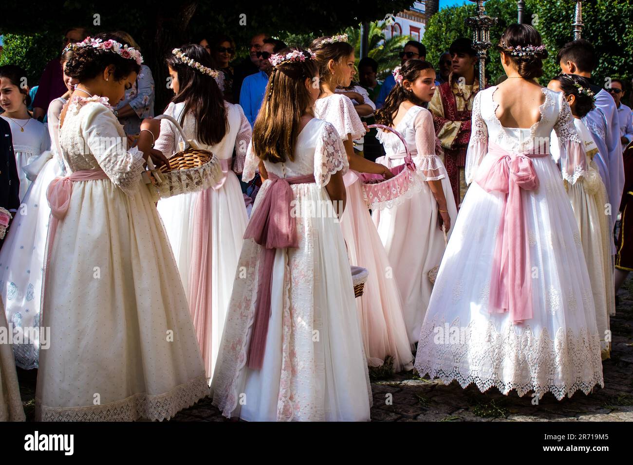Young children participating at the Corpus Christi procession, an age ...