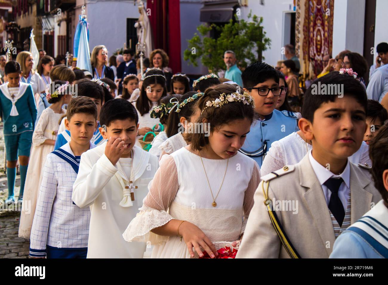 Young children participating at the Corpus Christi procession, an age ...