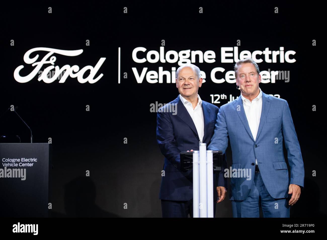 Cologne, Germany. 12th June, 2023. German Chancellor Olaf Scholz (l ...