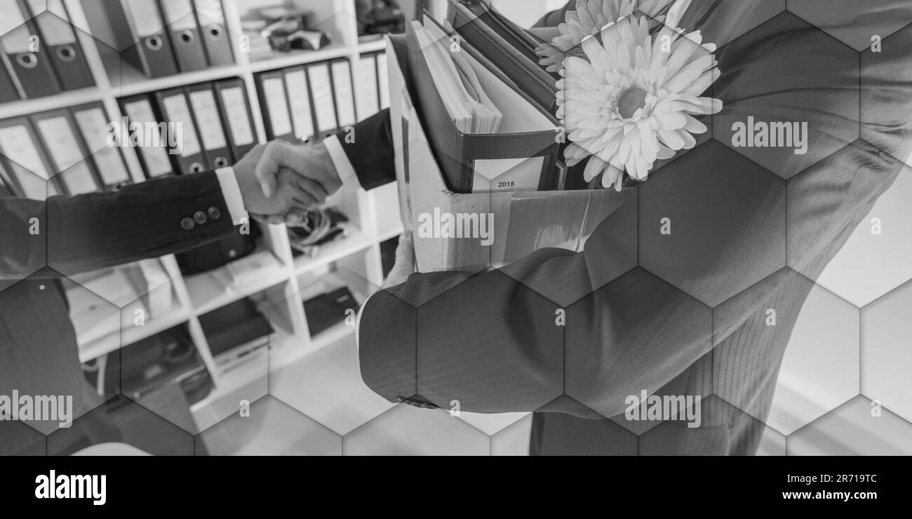 Manager welcoming a new employee at office, geometric pattern Stock ...