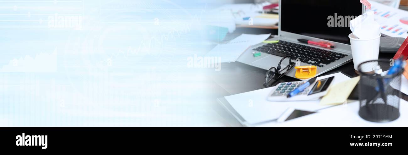 Messy and cluttered office desk; panoramic banner Stock Photo - Alamy