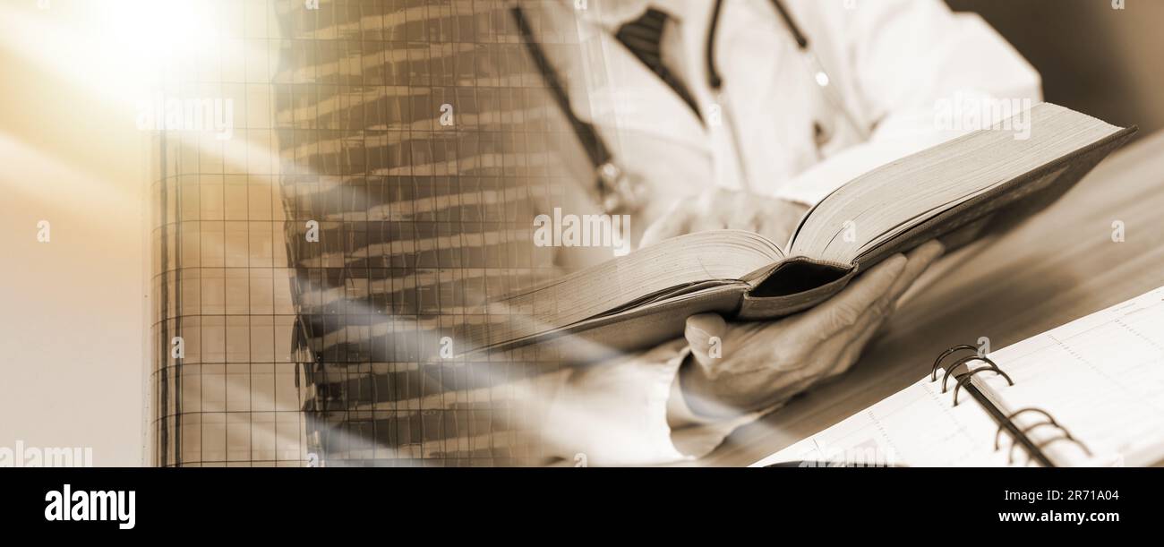 Doctor reading a textbook in medical office; multiple exposure Stock ...