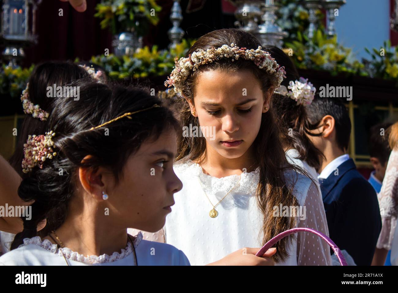 Young children participating at the Corpus Christi procession, an age ...