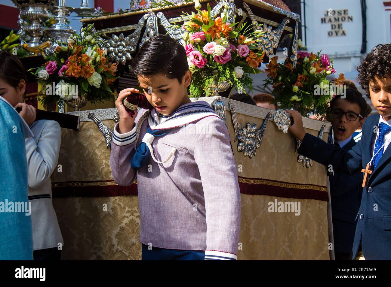 Young children participating at the Corpus Christi procession, an age ...