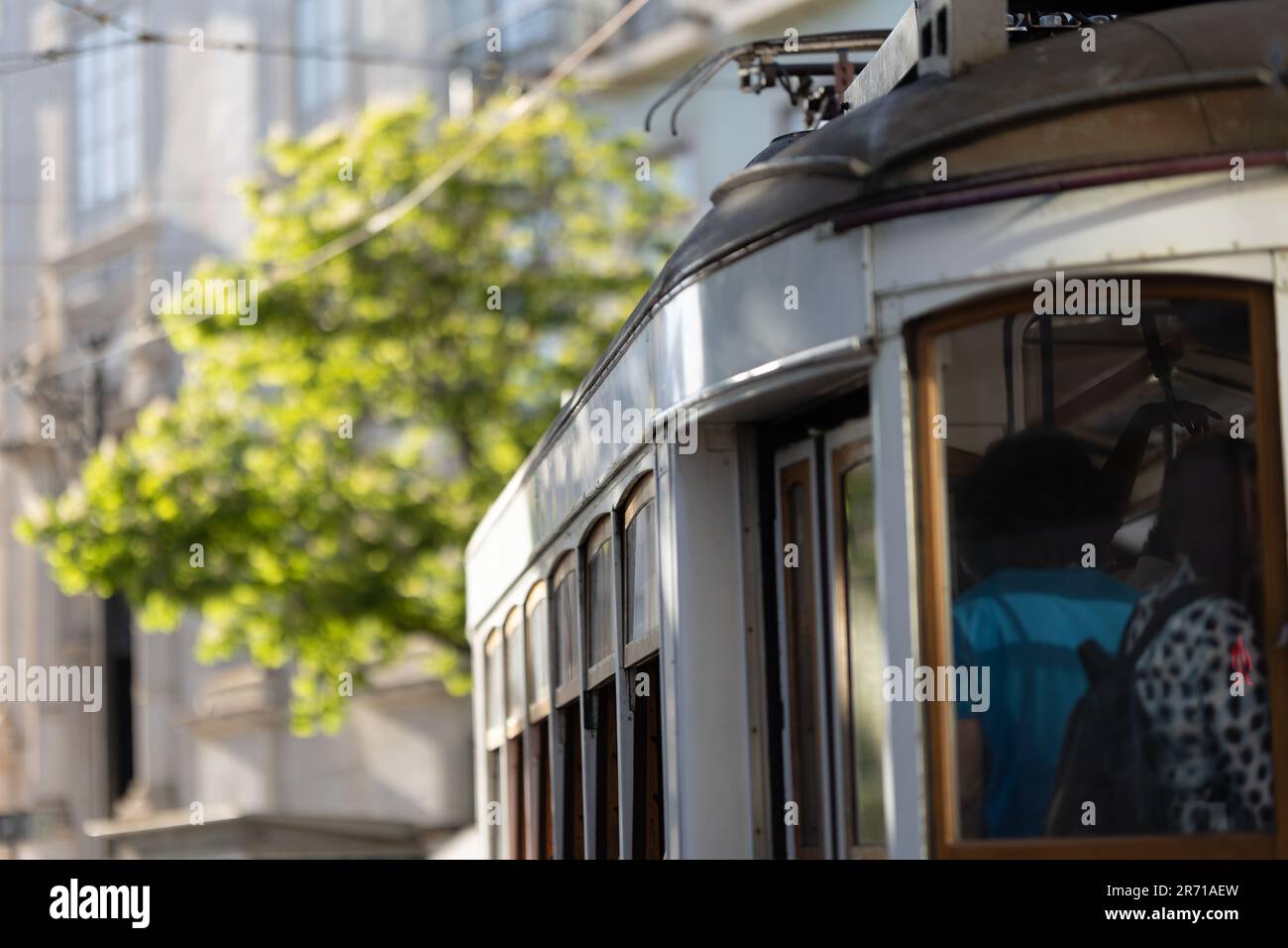 An old tram in the centre of Lisbon. Mid shot Stock Photo - Alamy