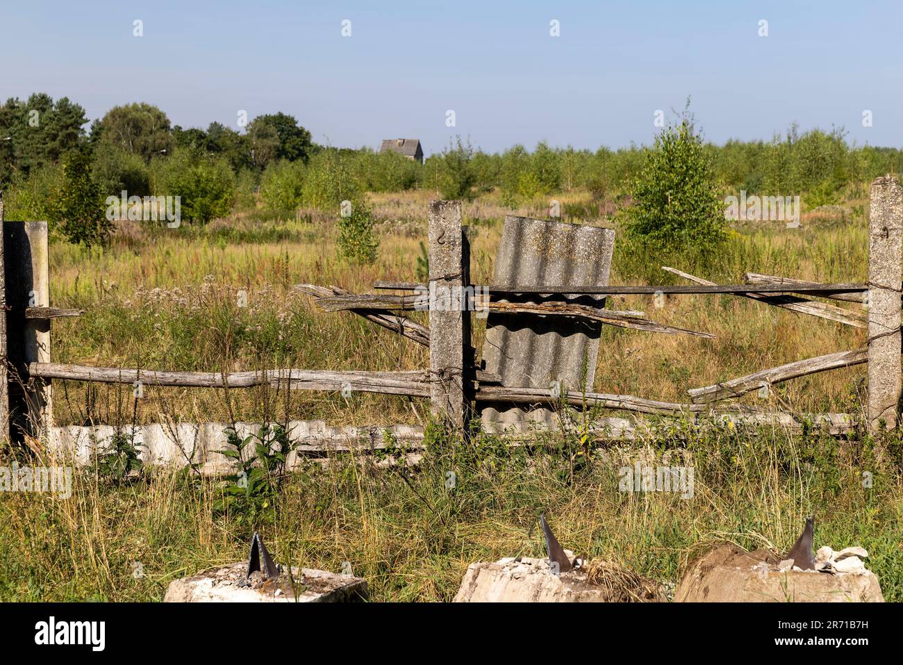 Damaged fence to ensure security, delineation of the territory of ...