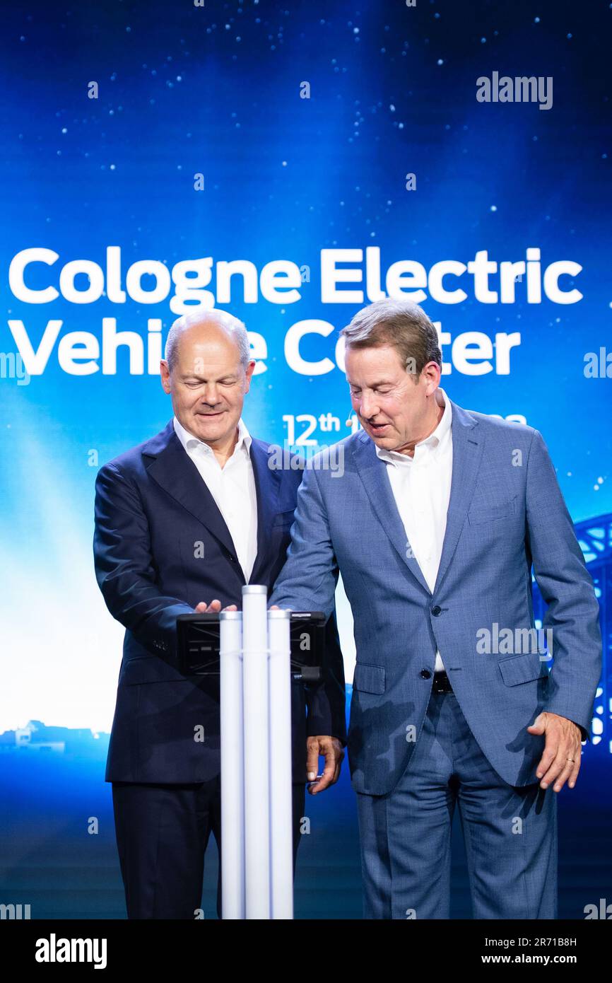 Cologne, Germany. 12th June, 2023. German Chancellor Olaf Scholz (l ...