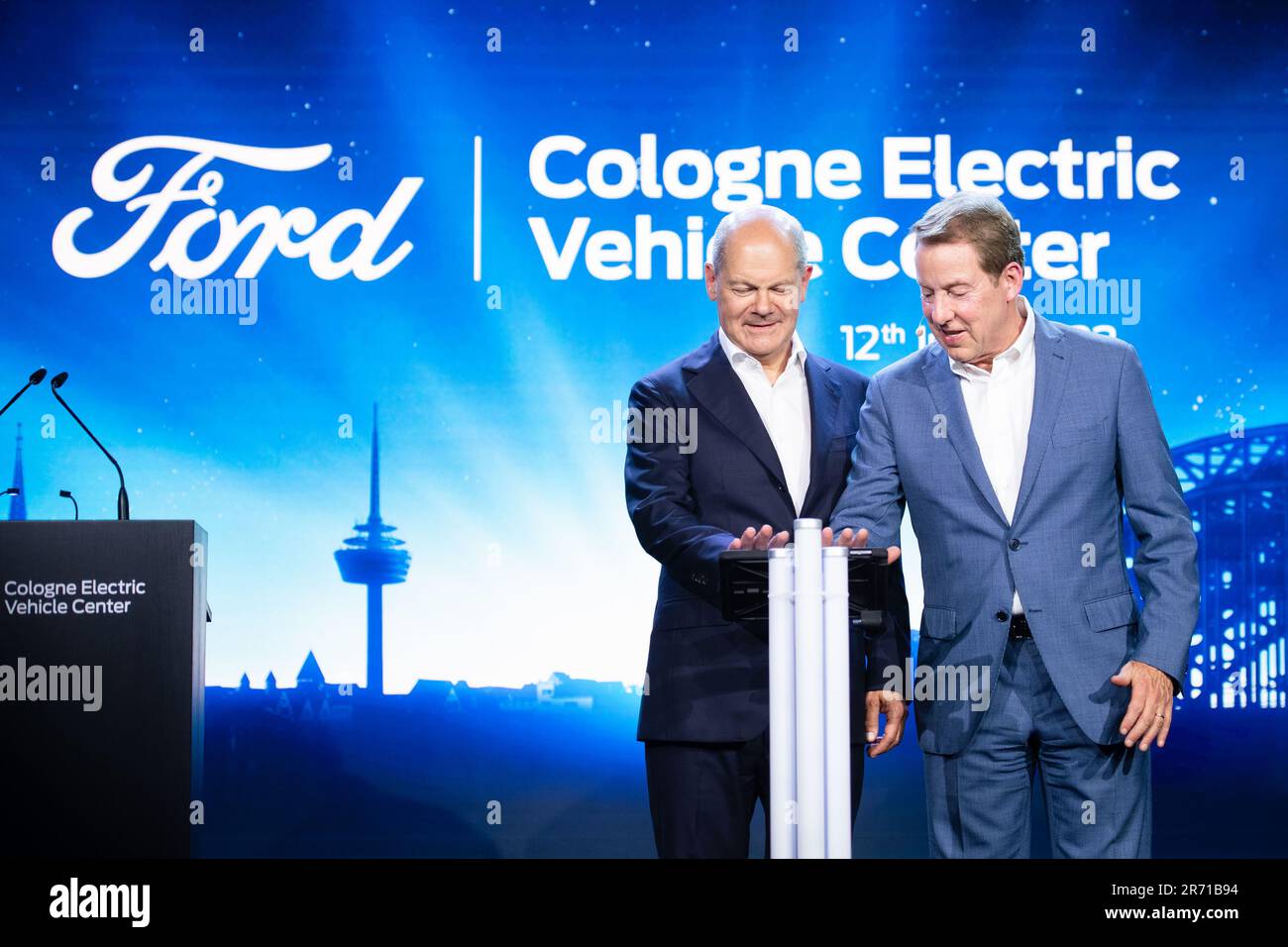 Cologne, Germany. 12th June, 2023. German Chancellor Olaf Scholz (l ...