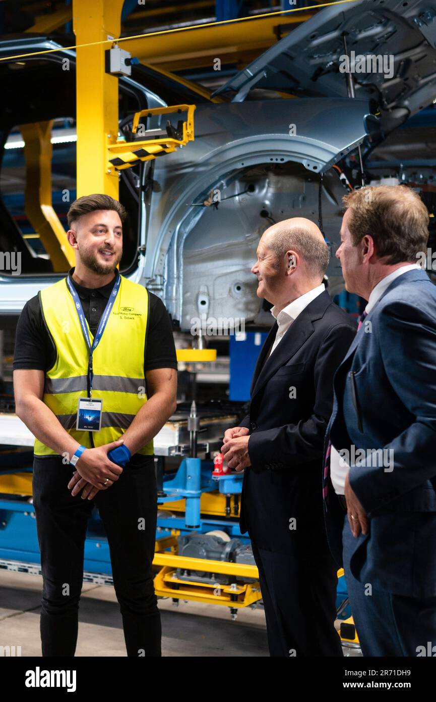 Cologne, Germany. 12th June, 2023. German Chancellor Olaf Scholz (M ...