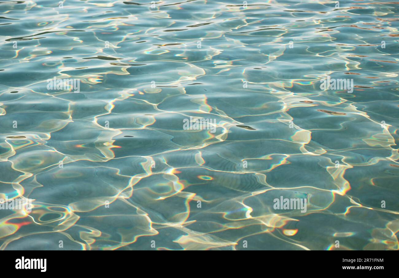 Artistic patterns of water surface in the pool reflecting with the ...