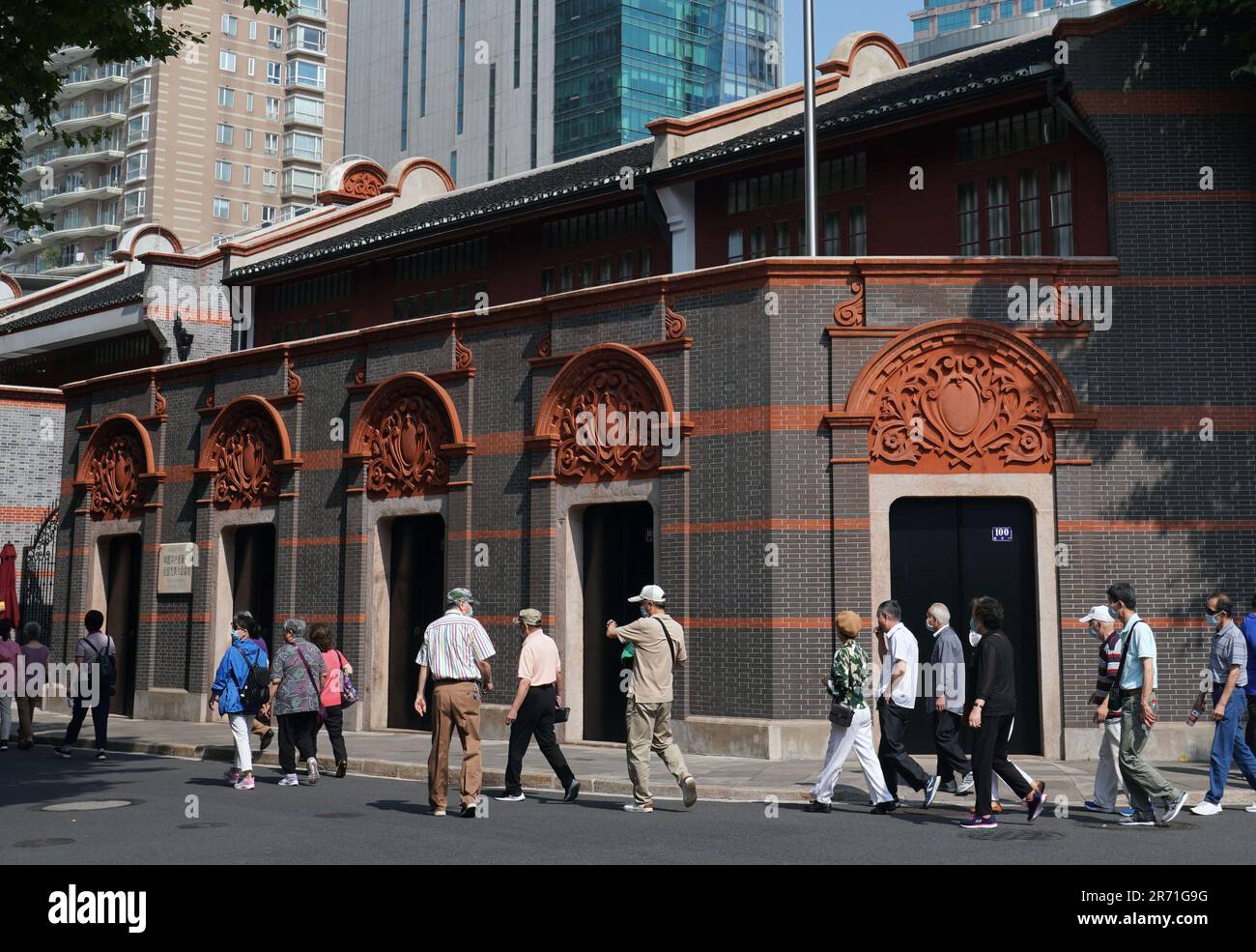 Shanghai. 9th June, 2023. People pass the site of the first National ...