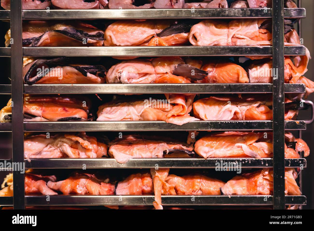 Racks of salmon smoking in a small smoker Stock Photo - Alamy