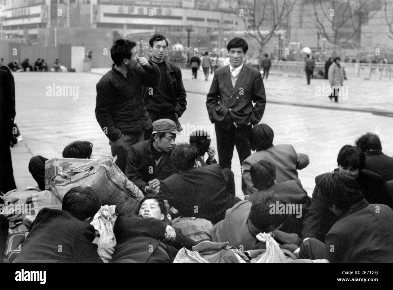 Shanghai China 2000. Migrant workers at the railway station, part of ...