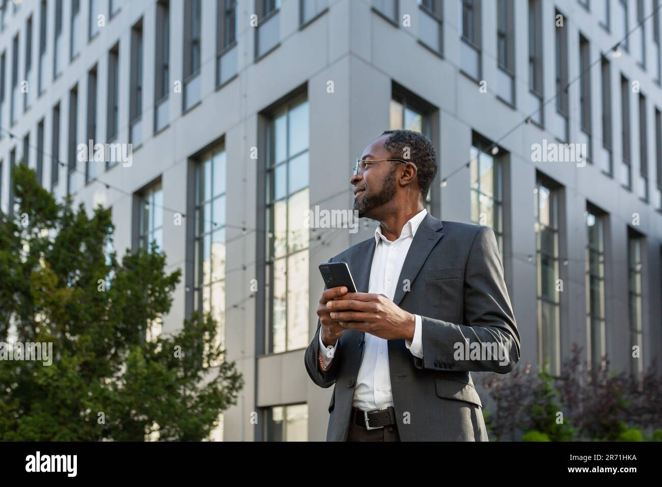 Happy african american man types hi-res stock photography and images ...