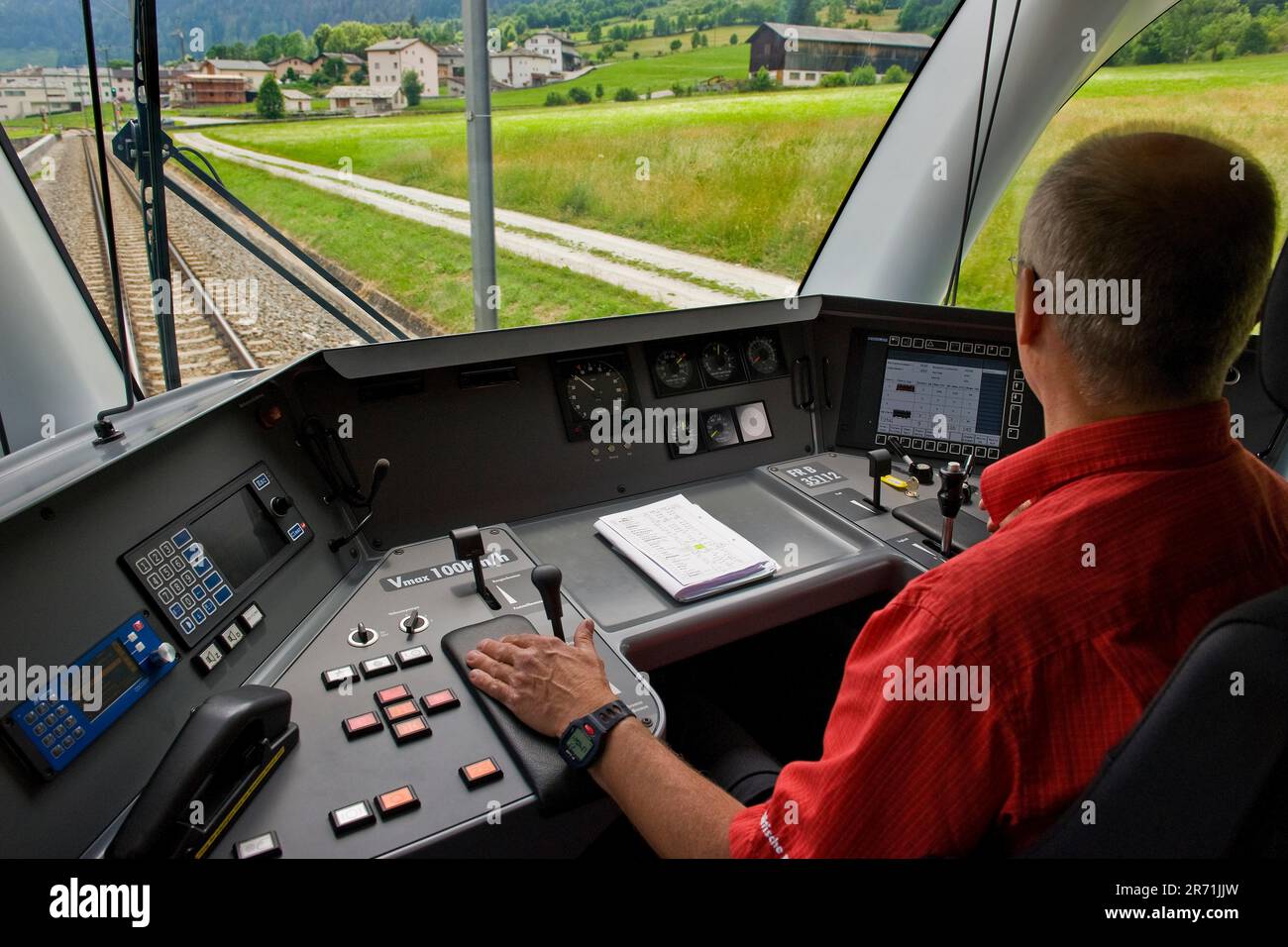 Switzerland, Canton Grisons, Bernina express, train driver Stock Photo ...