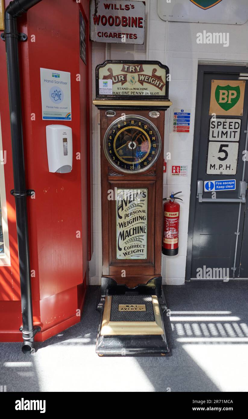 A vintage Try your weight machine Stock Photo - Alamy