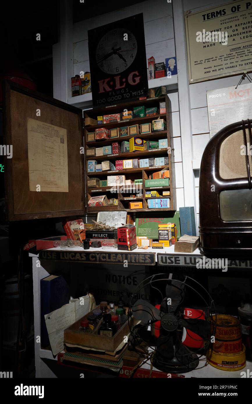 An Old fashioned mechanics workshop garage full of vintage parts for ...