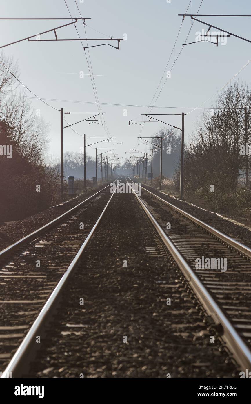 A scenic view of a train station, featuring long railroad tracks Stock ...