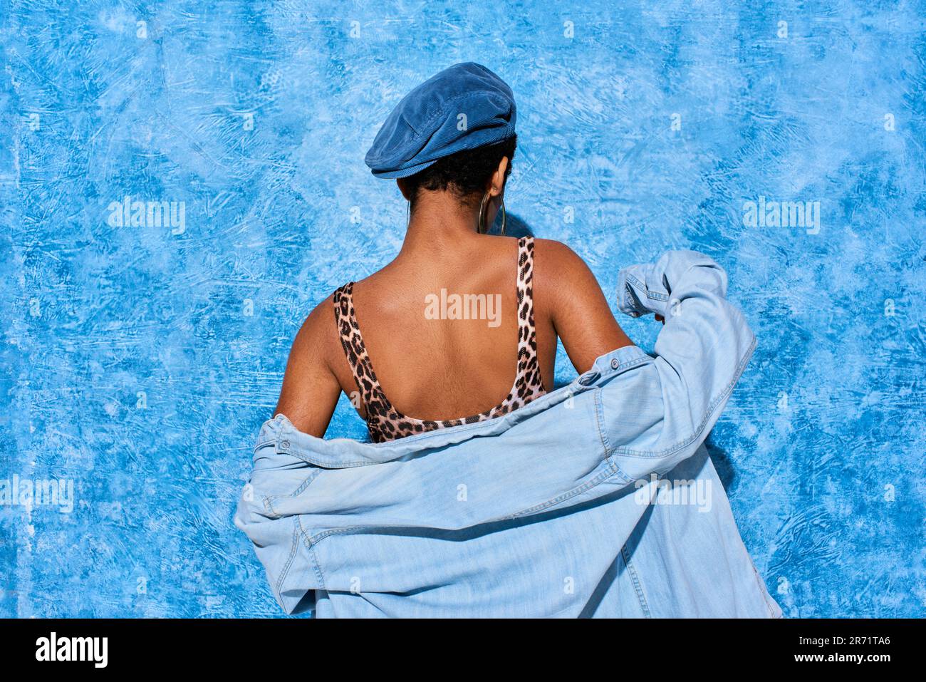 Back view of short haired and trendy african american woman in beret ...