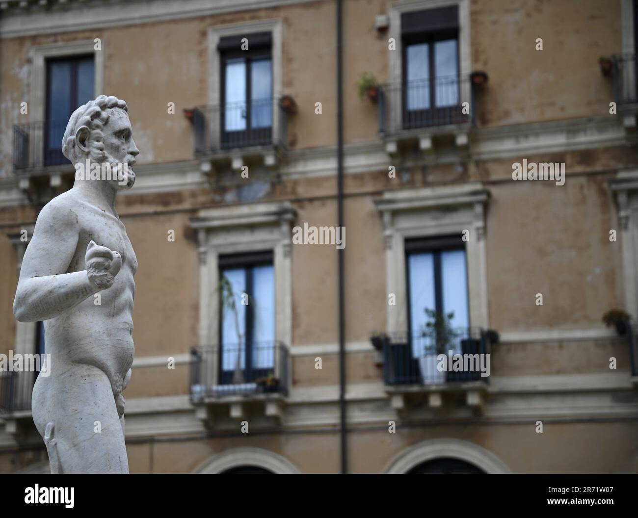 Marble sculpture on the foreground of Palazzo Bruca an antique ...