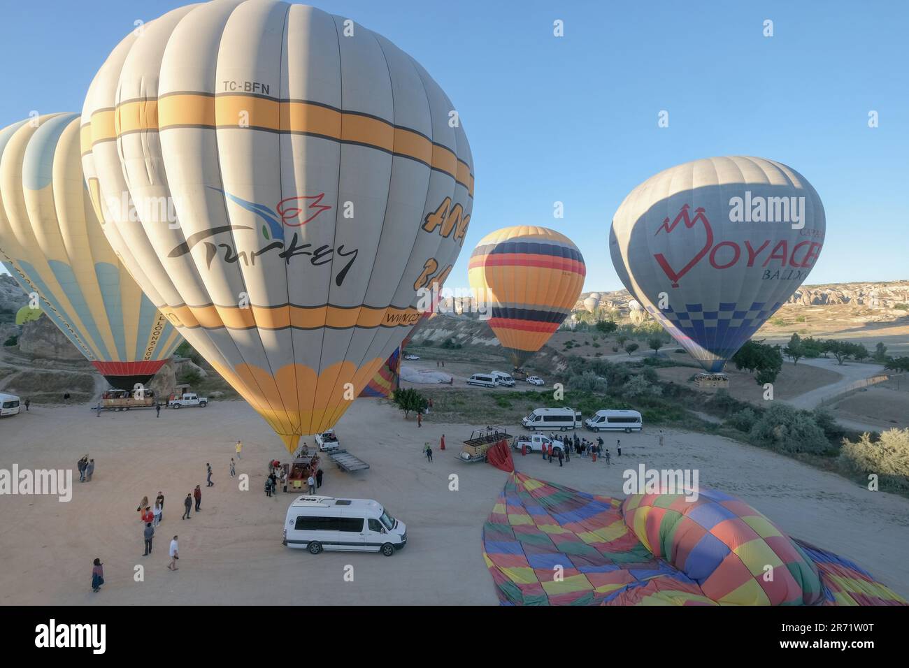 hot air ballon landing after over cappadocia, Turkey Stock Photo - Alamy