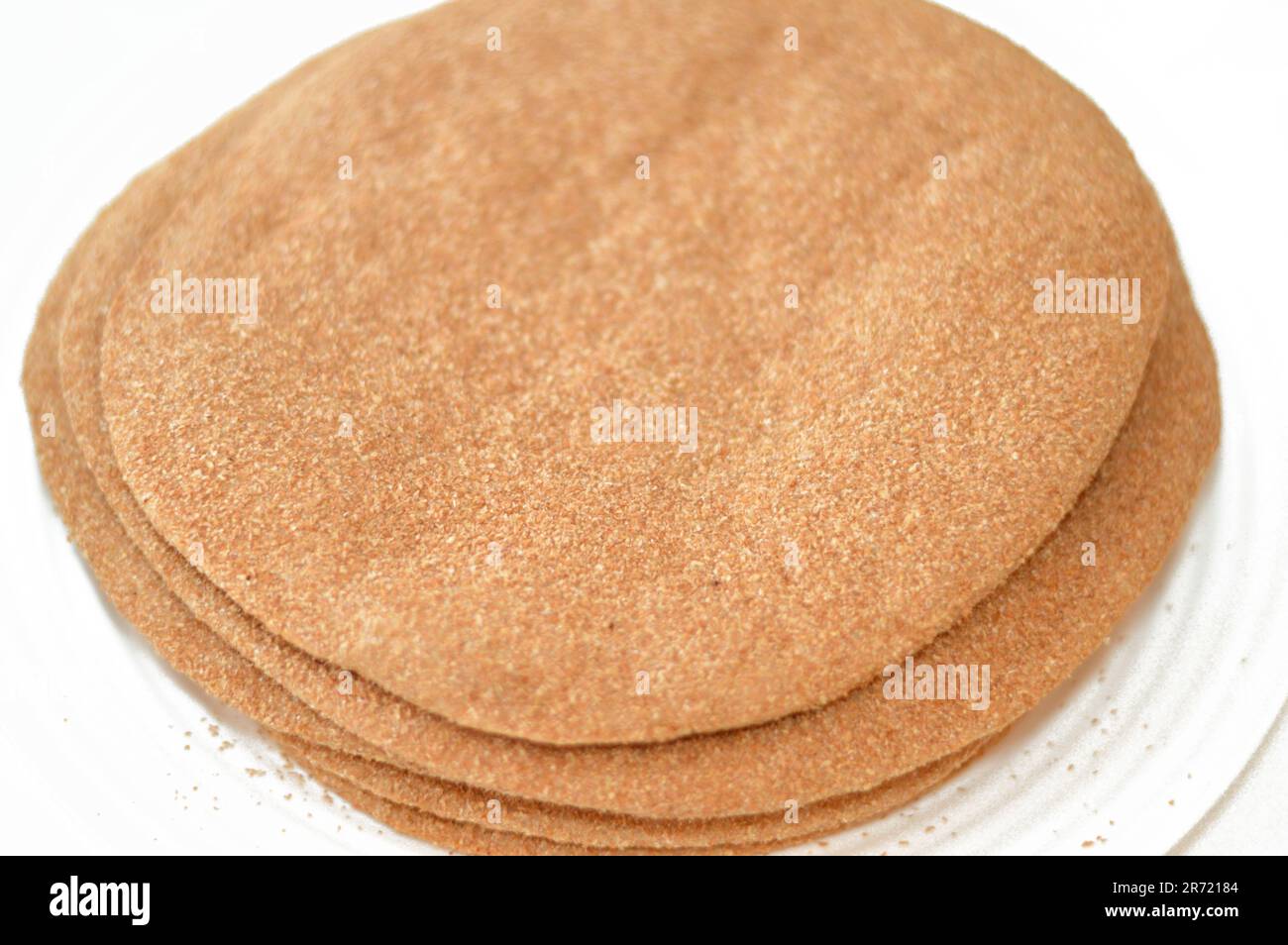 Brown baked pitta bread flatbread made mainly in bran, Bran breads used ...