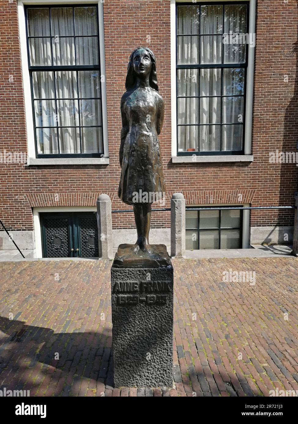 Statue of Anne Frank. by Mari Andriessen. outside the Westerkerk in ...