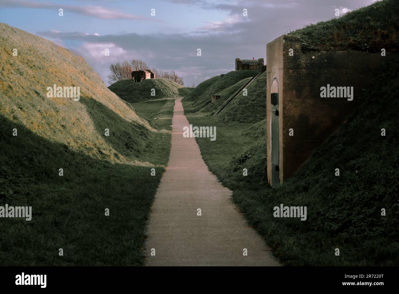 An idyllic pathway winding through a picturesque landscape of rolling ...
