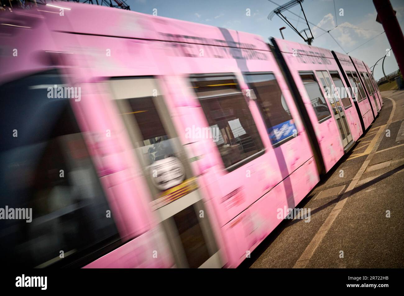 Pink tram speeding along Blackpool seafront Stock Photo - Alamy