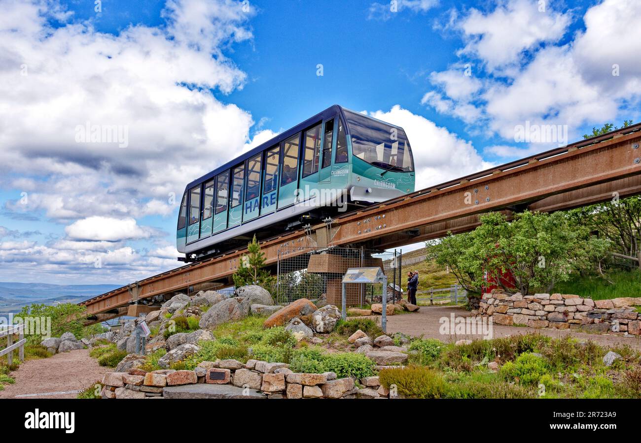 Aviemore Scotland early summer Cairngorm Mountain people watching the Hare funicular railway ...