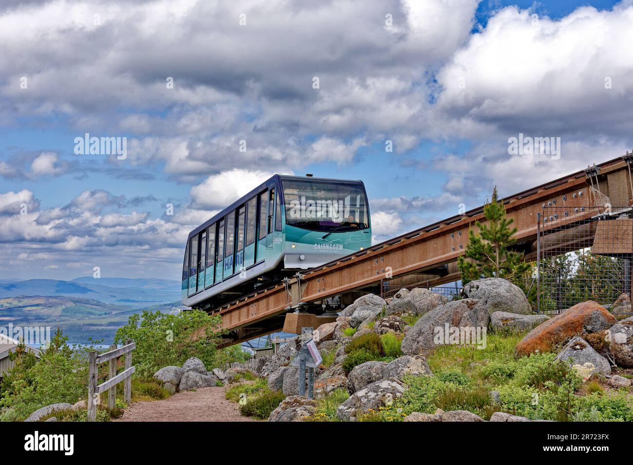 Aviemore Scotland early summer Cairngorm Mountain the Hare funicular railway train above the ...