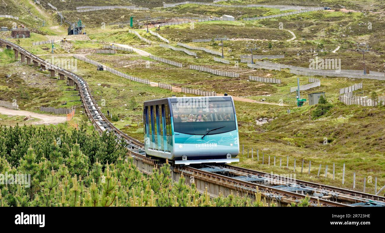 Aviemore Scotland early summer Cairngorm Mountain the Hare funicular railway train heading ...