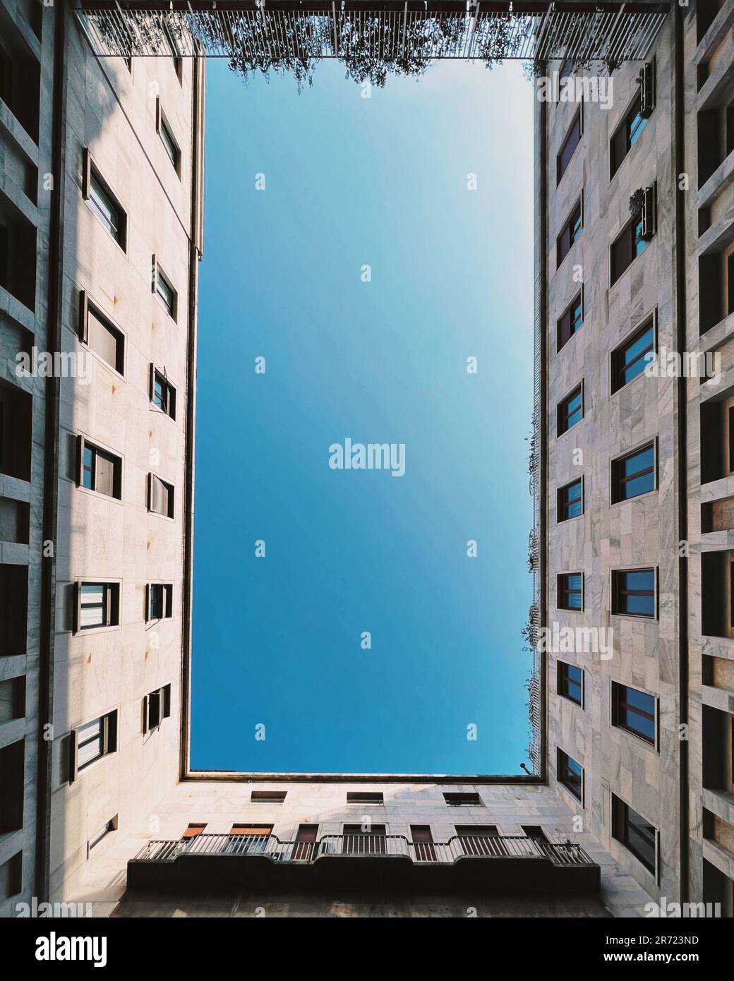 A low angle shot of a modern building, showcasing the architecture of ...