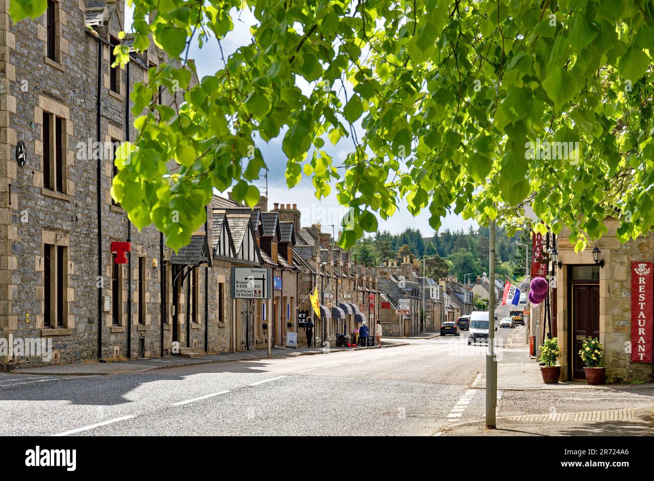 Tomintoul Moray Scotland the village in early summer green leaves shops ...