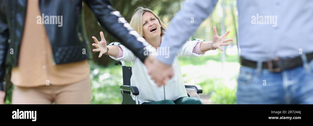 Disabled woman in wheelchair screaming or crying Stock Photo - Alamy