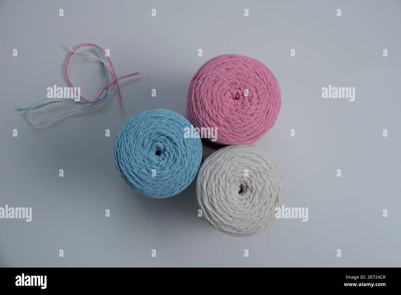 Color thread for kitting. Kitting concept.background Stock Photo - Alamy