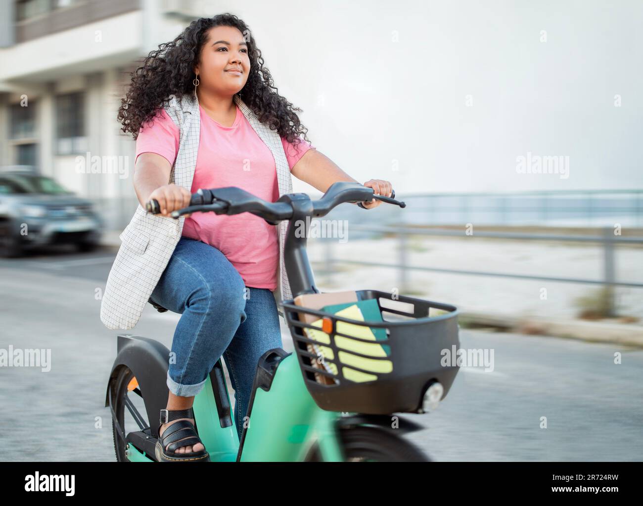 Overweight woman riding bike hi-res stock photography and images - Alamy