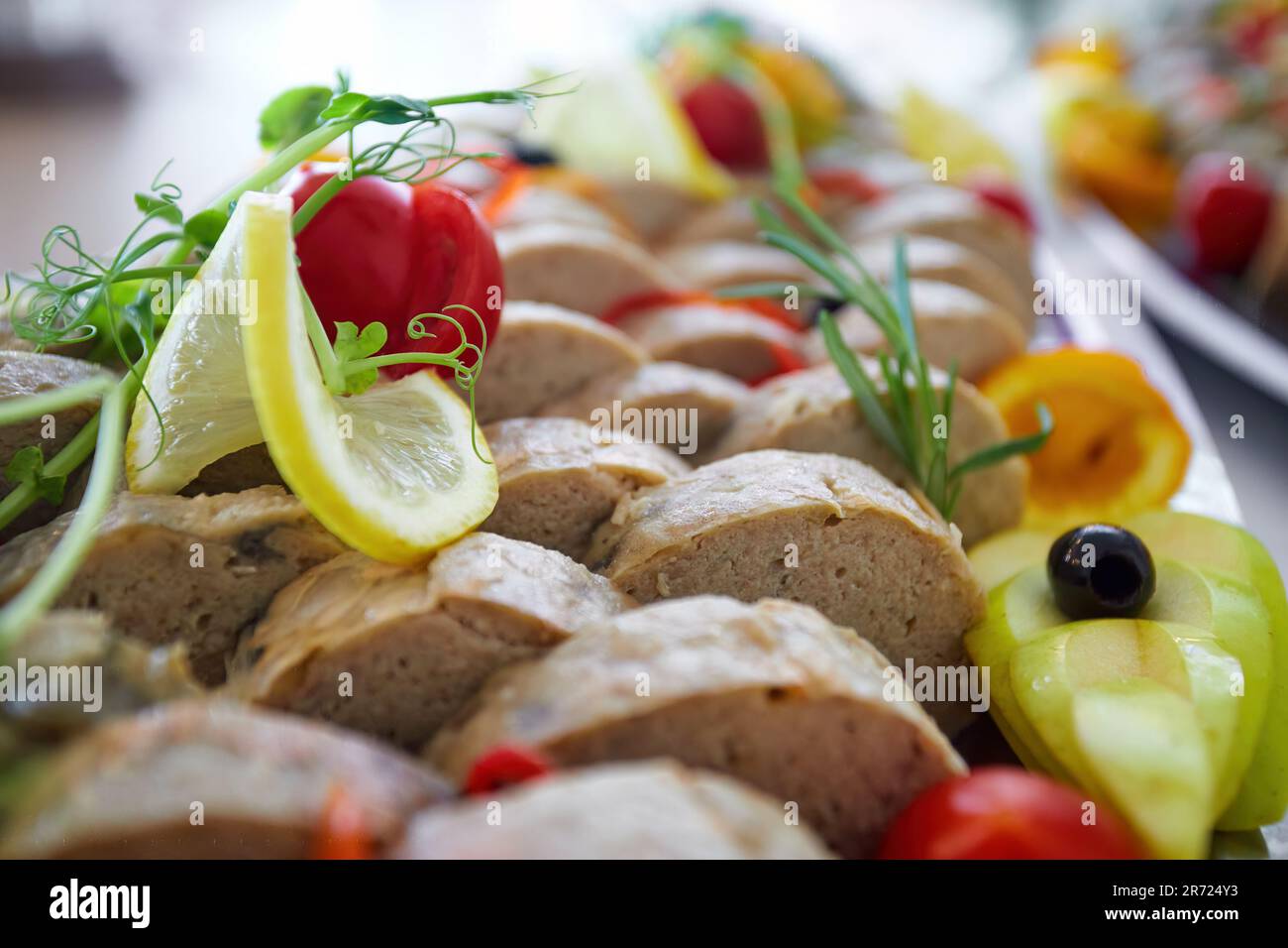 mouthwatering stuffed fish dish showcased on banquet table, shallow ...