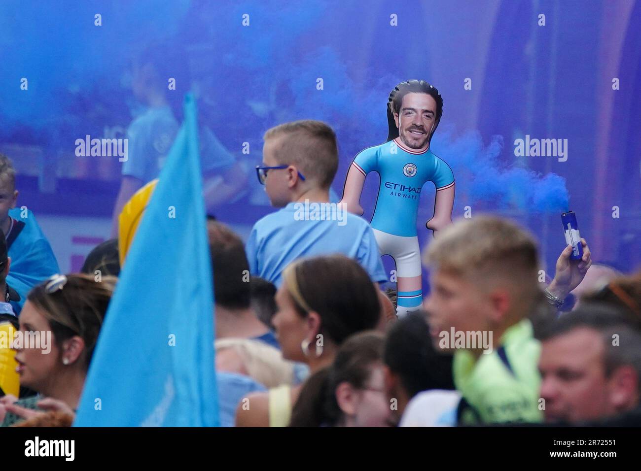 A fan waves an inflatable doll with the face of Manchester City's Jack ...