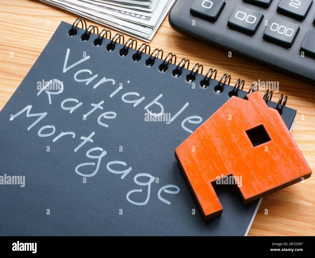 Note with inscription variable rate mortgage VRM and model of house ...