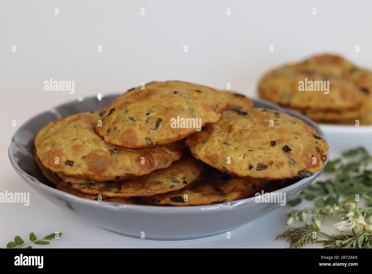 Daal poori with moringa leaves. Deep fried Indian flat bread made of ...