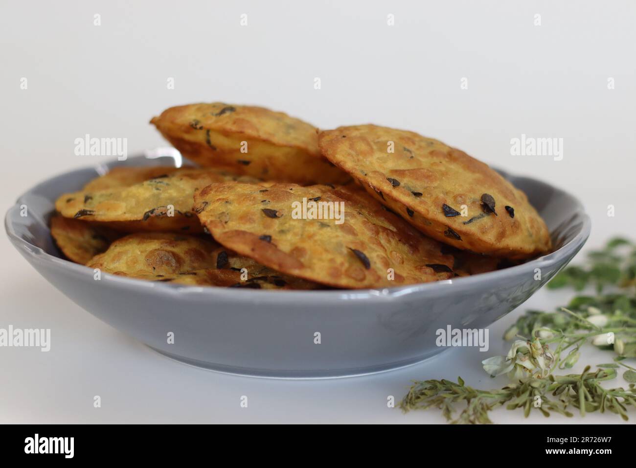Daal poori with moringa leaves. Deep fried Indian flat bread made of ...