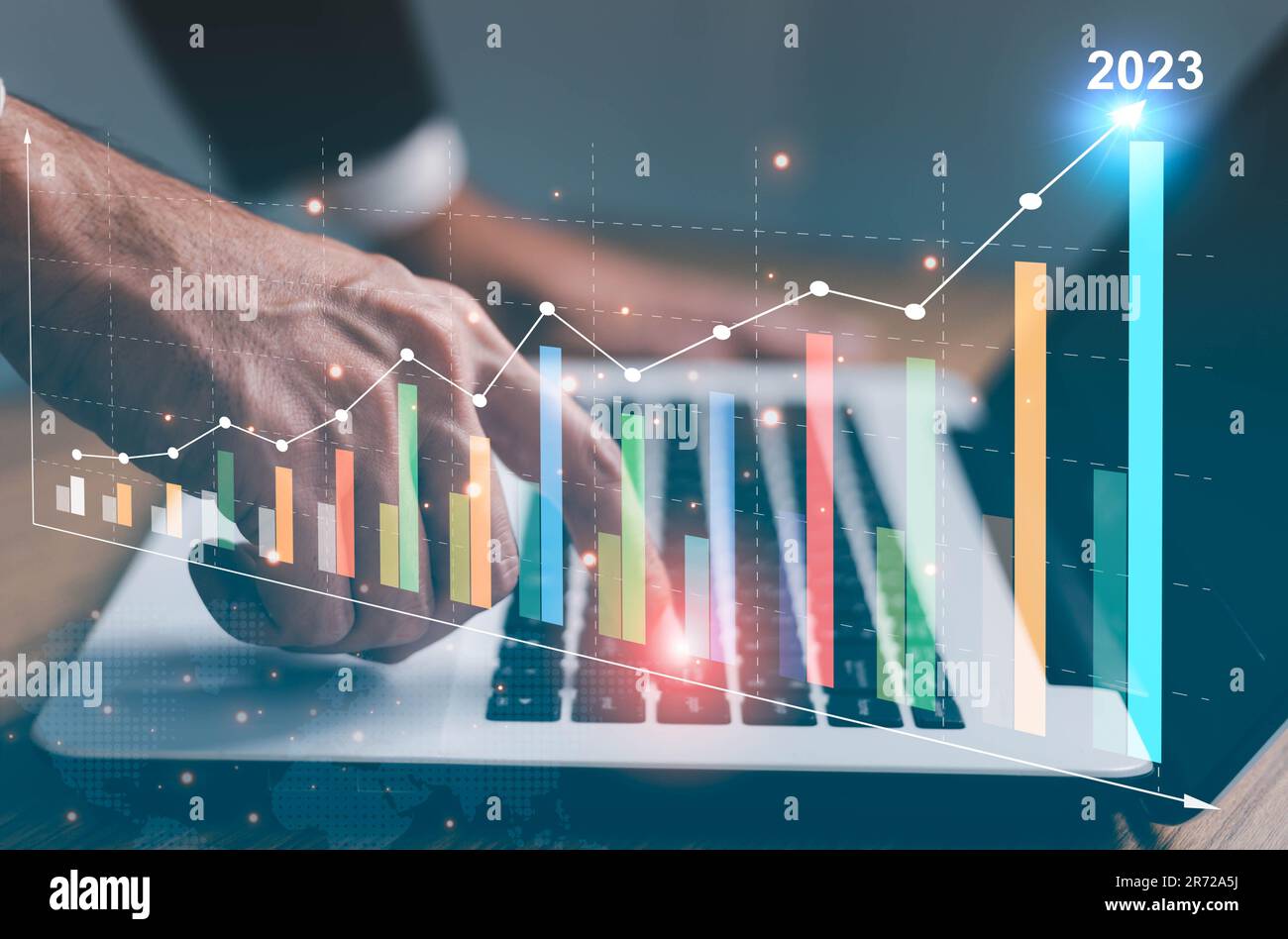 Businessman use laptop with virtual increasing technical graph and up ...