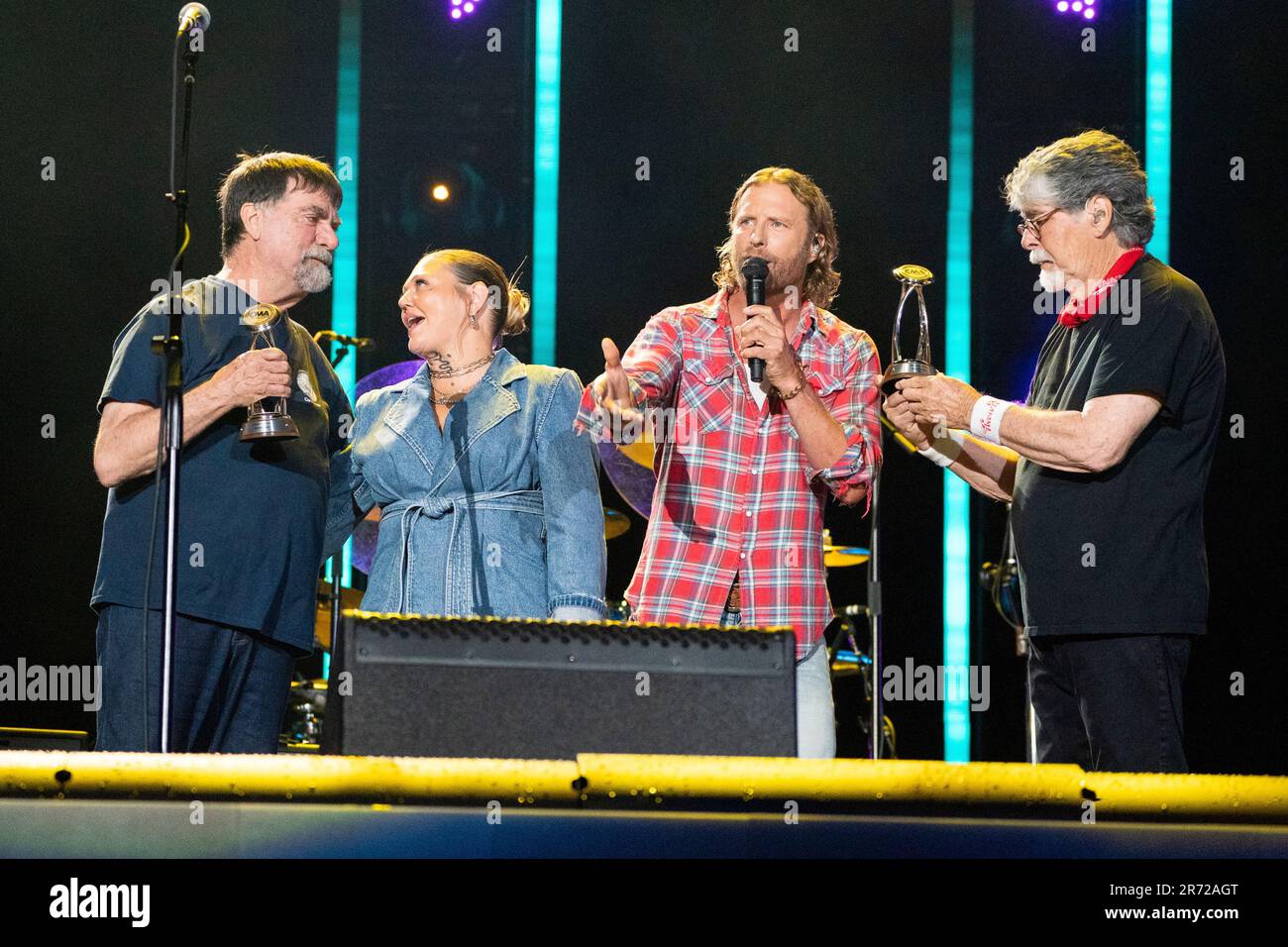 Teddy Gentry, left, Elle King, Dierks Bentley, and Randy Owen are seen ...