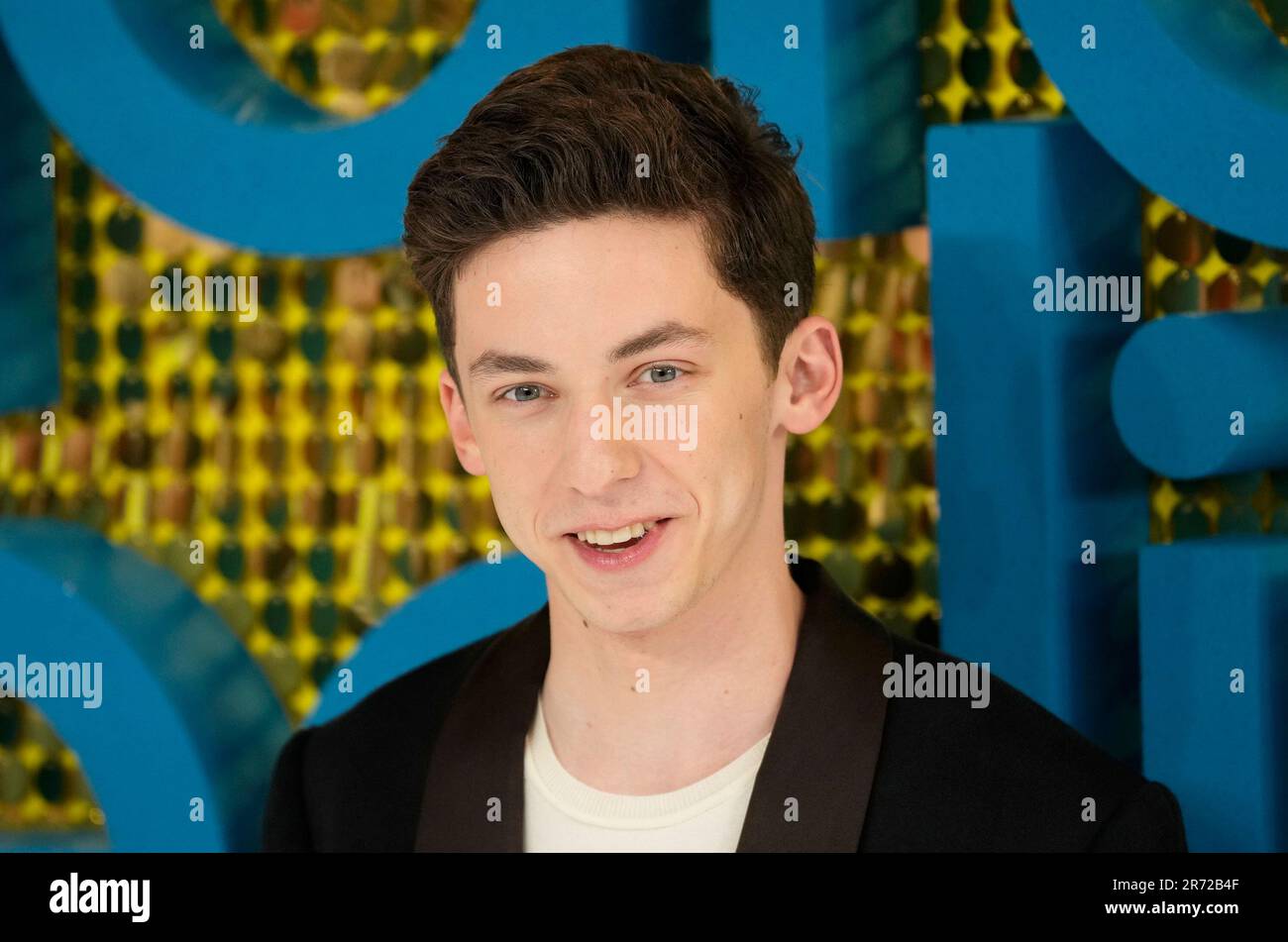 Andrew Barth Feldman poses for photographers upon arrival at the ...
