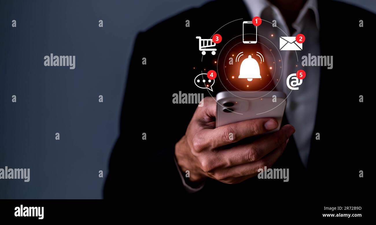 Business people using smartphone with virtual bell ringing for ...