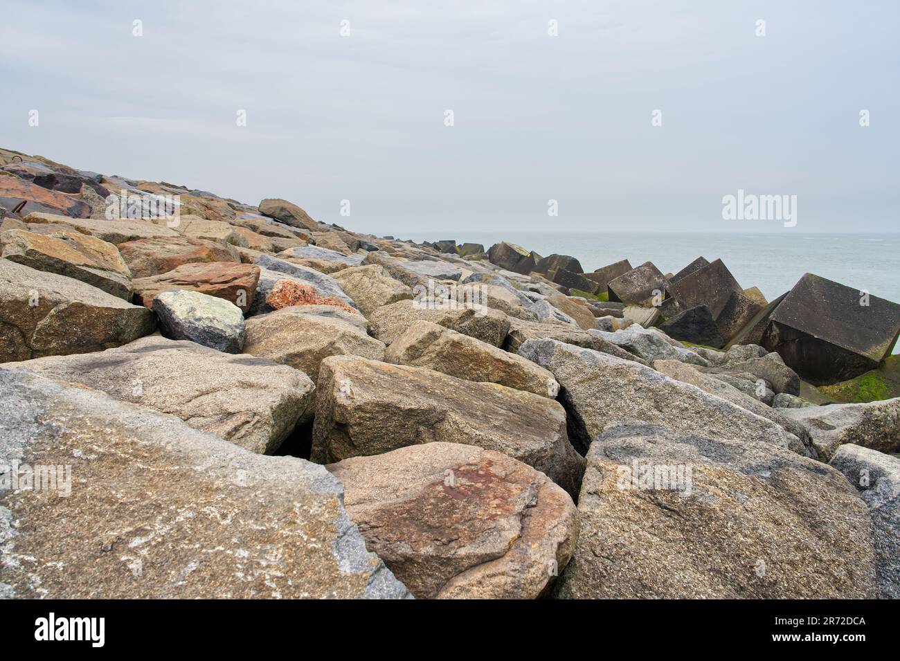 Massive concrete breakwaters on Sea coast. protect the coast from ...