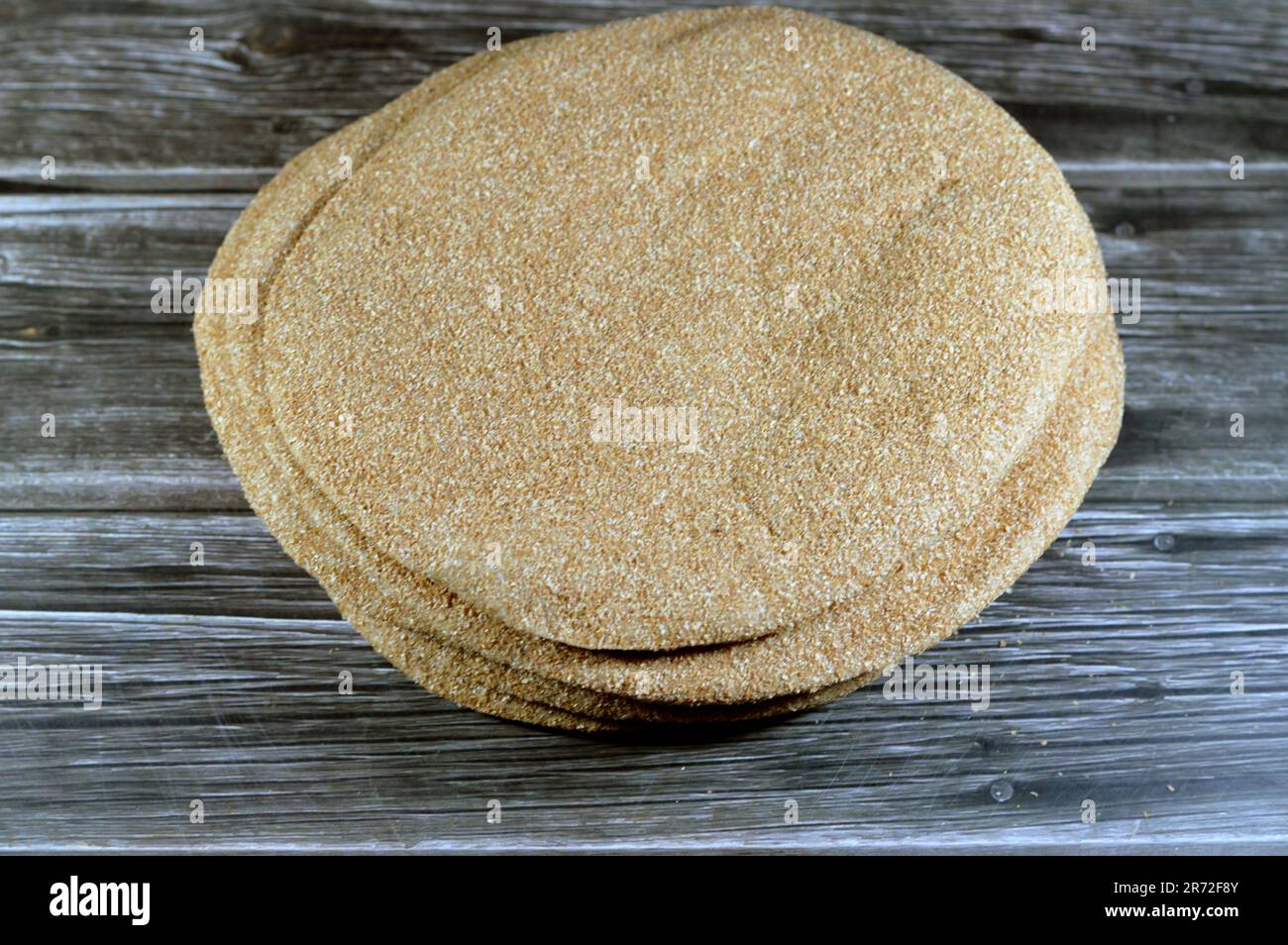 Brown baked pitta bread flatbread made mainly in bran, Bran breads used ...